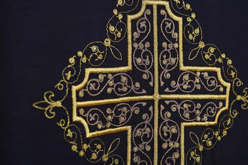 embroidered cross on purple – Saint Ann Melkite Catholic Church